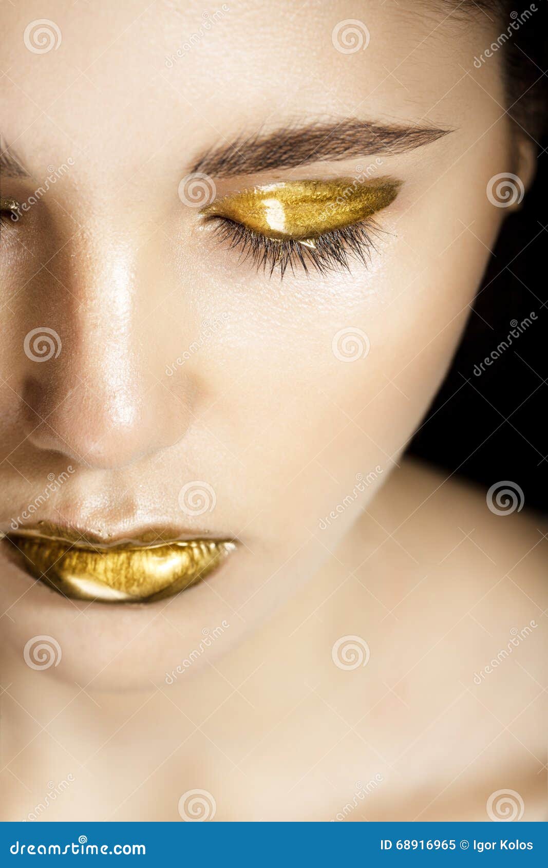 Woman with gold make-up stock image. Image of culture - 68916965