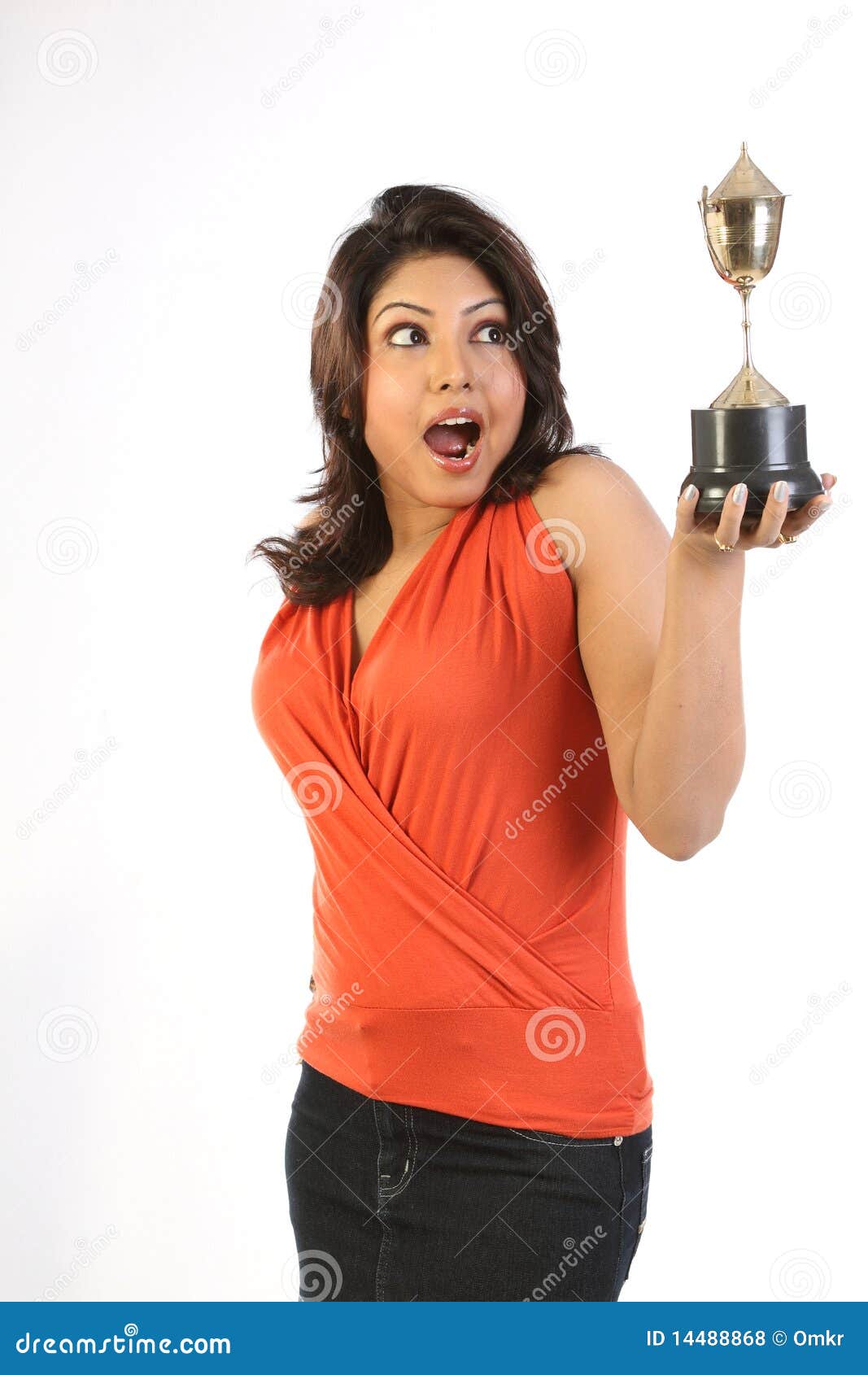 Woman with gold trophy stock photo. Image of excited - 14488868