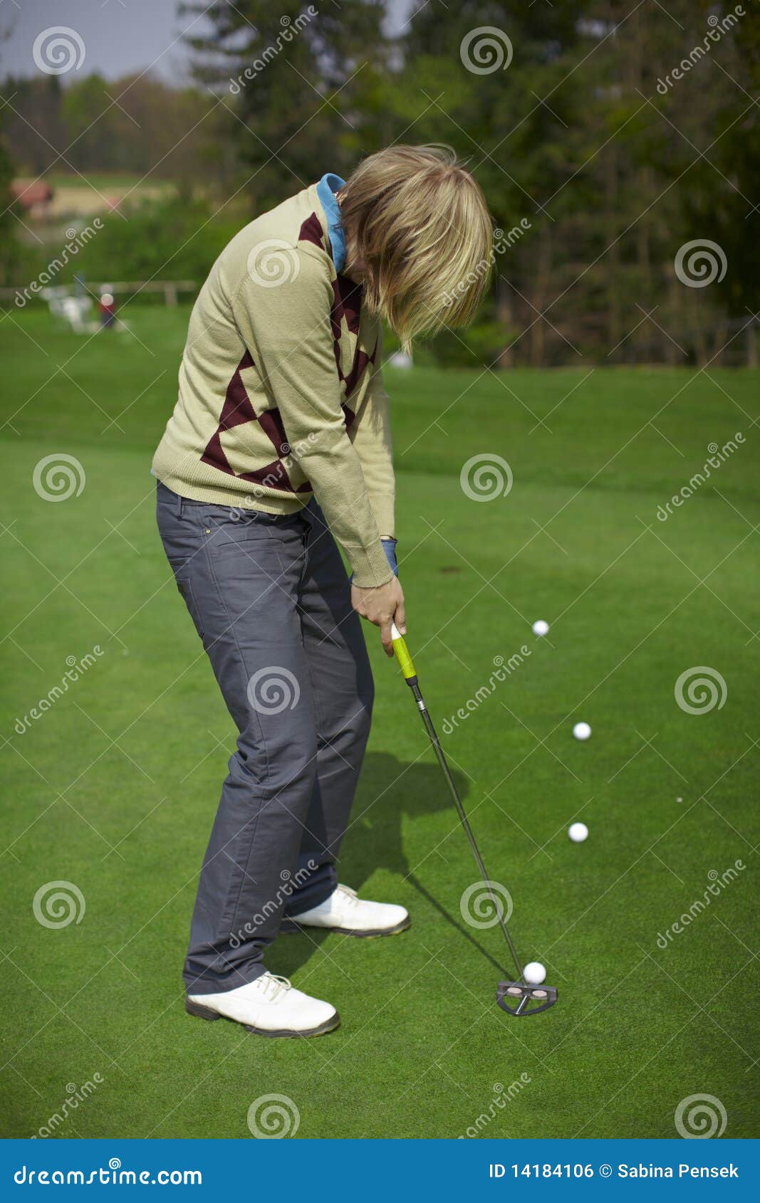 Woman Golfer Practicing Putting Stock Photo - Image of persist ...