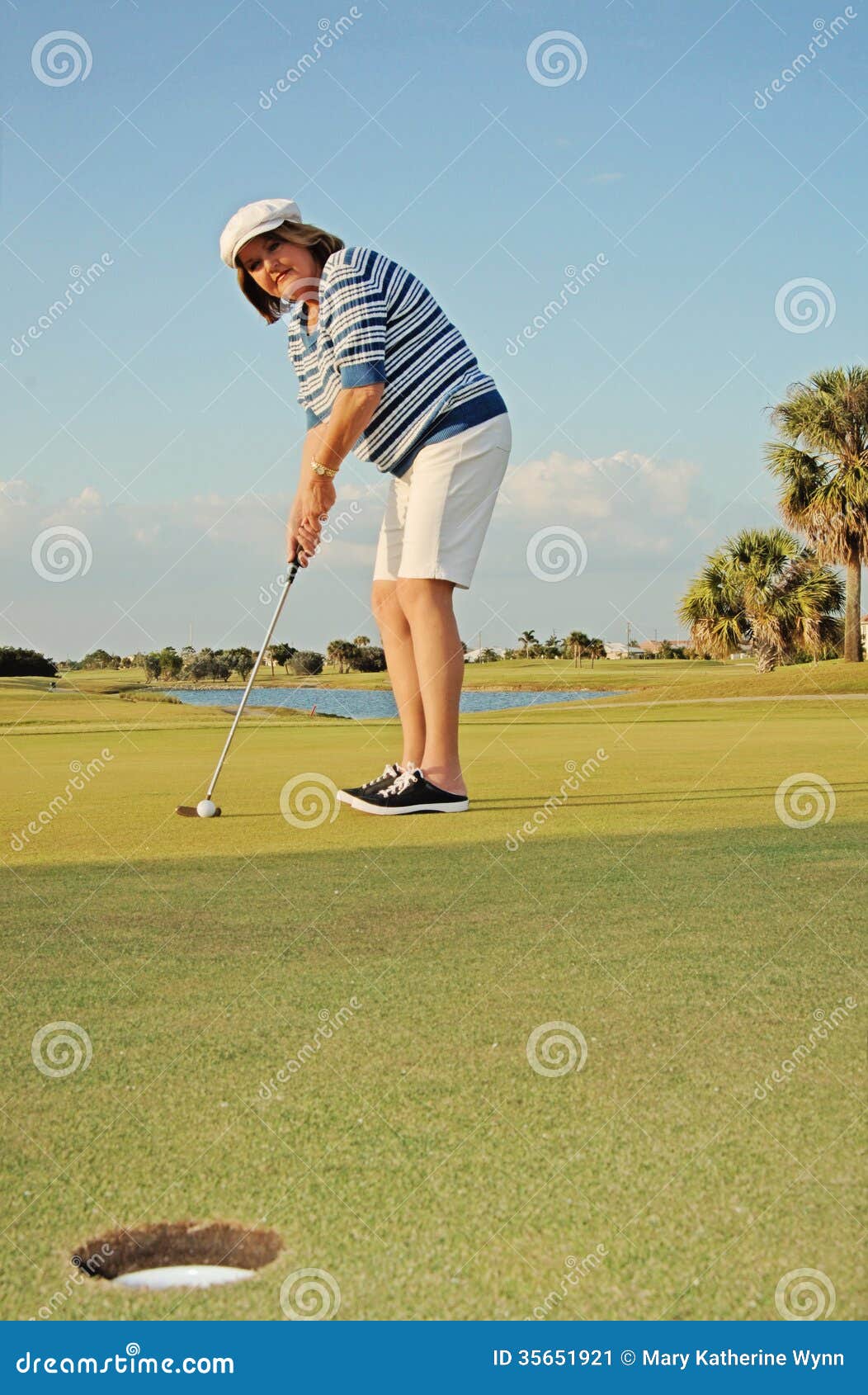 Senior Woman golfing stock image. Image of female, golf - 35651921