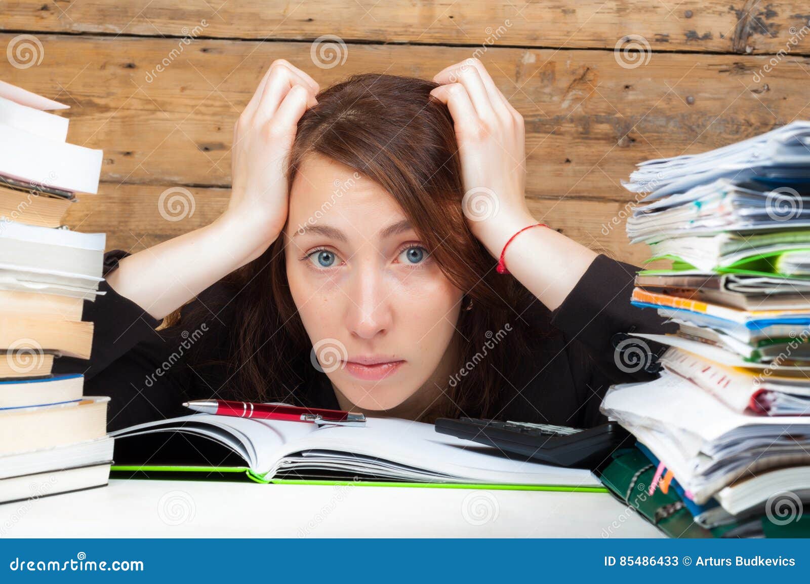 Woman Got Tired of Working and Studying Next To the Stack of Paper ...