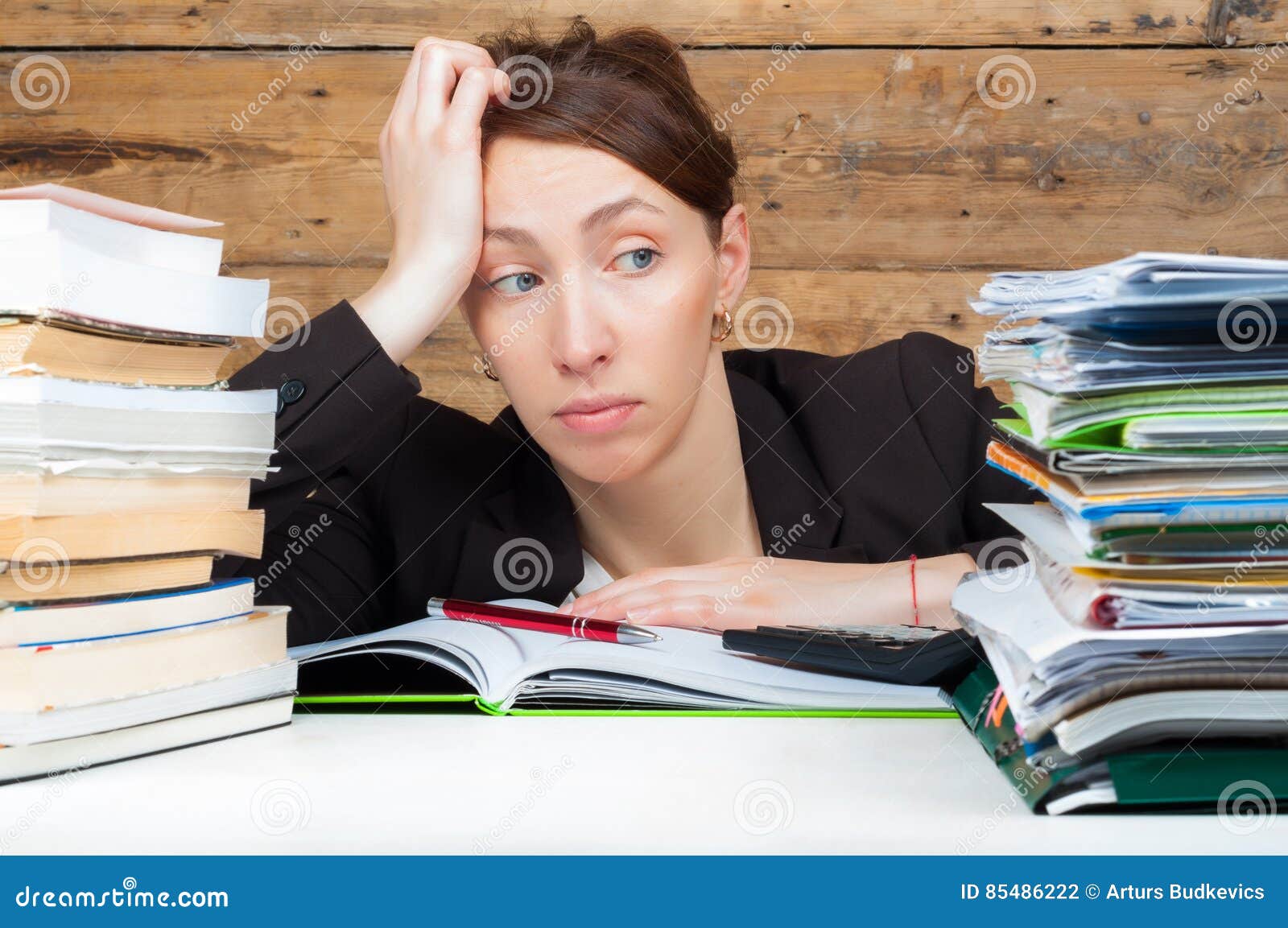 Woman Got Tired of Working and Studying Next To the Stack Stock Photo ...