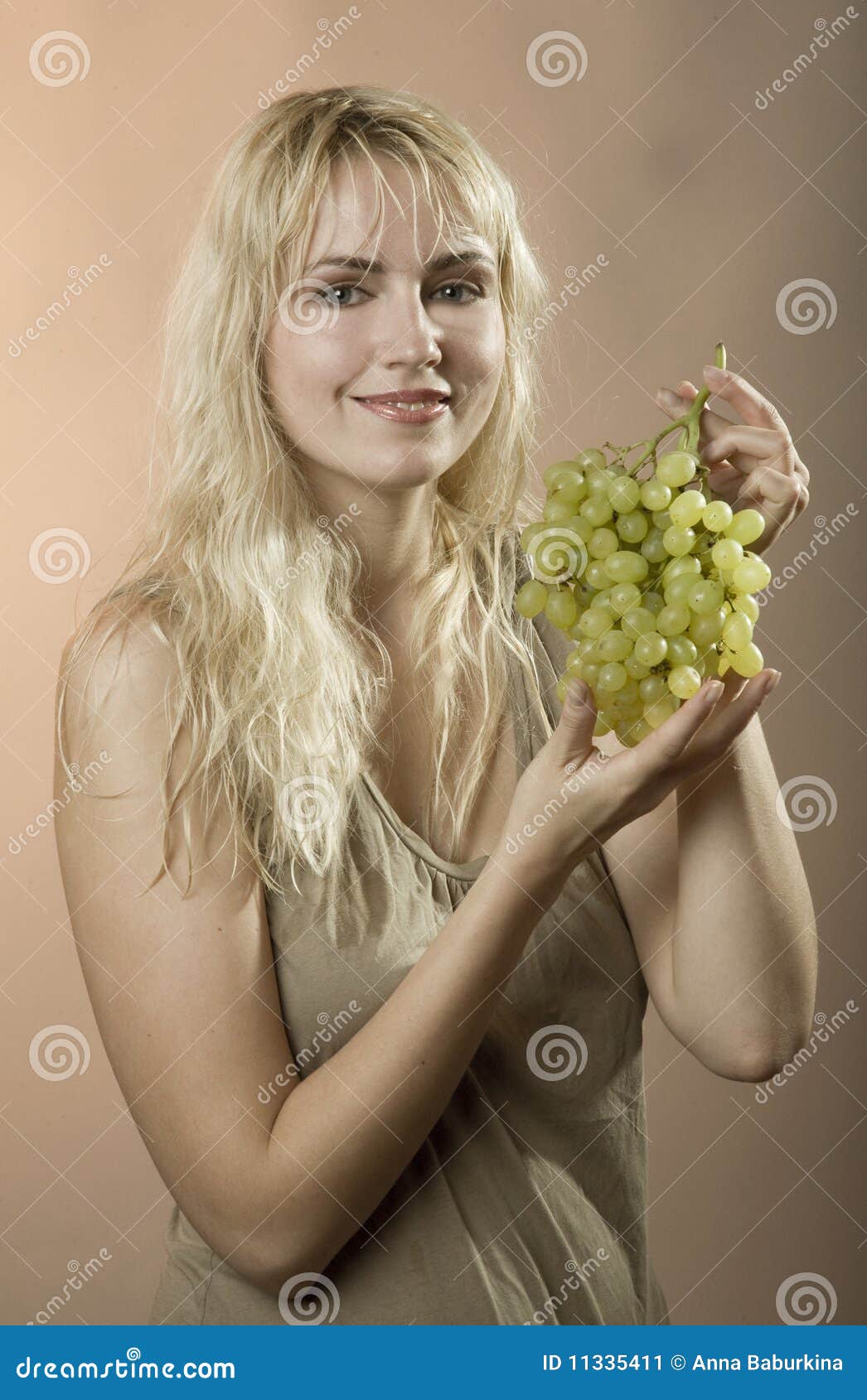 Woman with grape stock image. Image of nourish, diet - 11335411