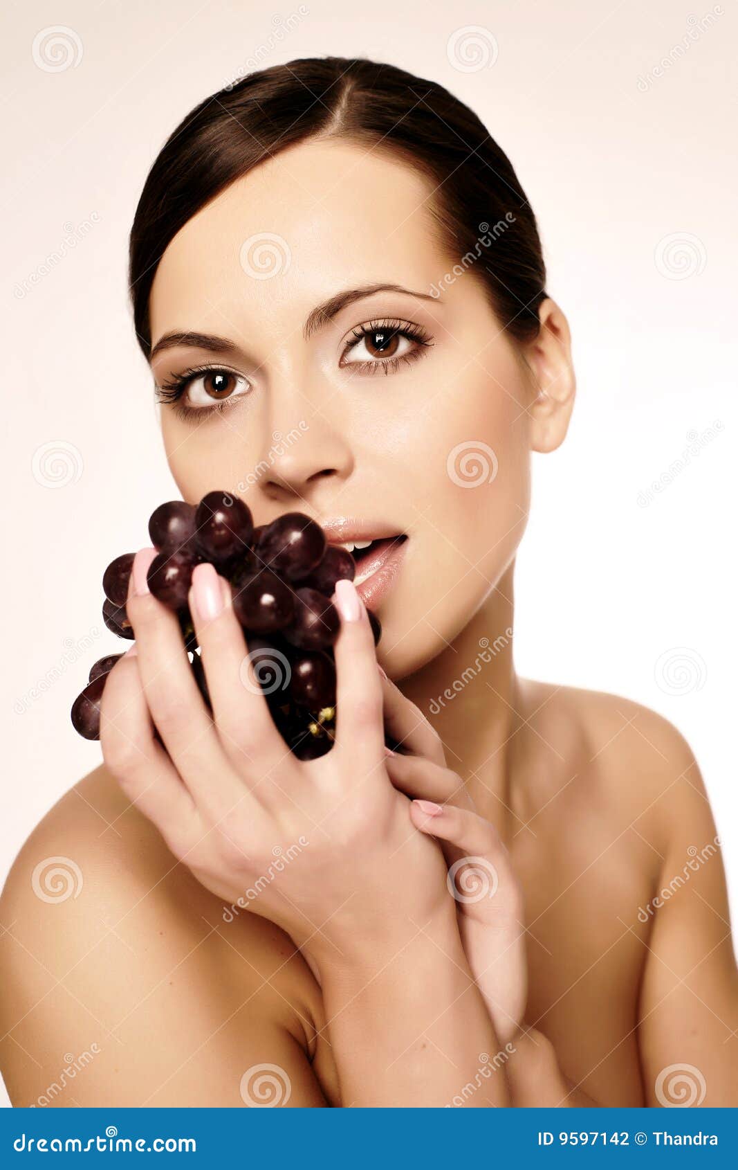 Woman with grape stock photo. Image of eating, attractive - 9597142