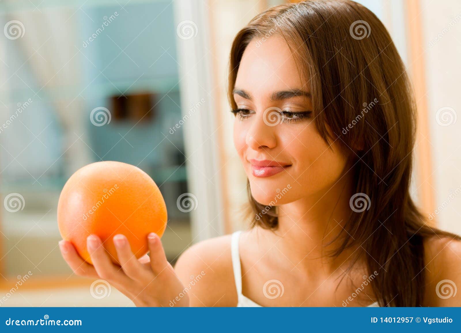 Woman with grapefruit stock image. Image of face, european - 14012957