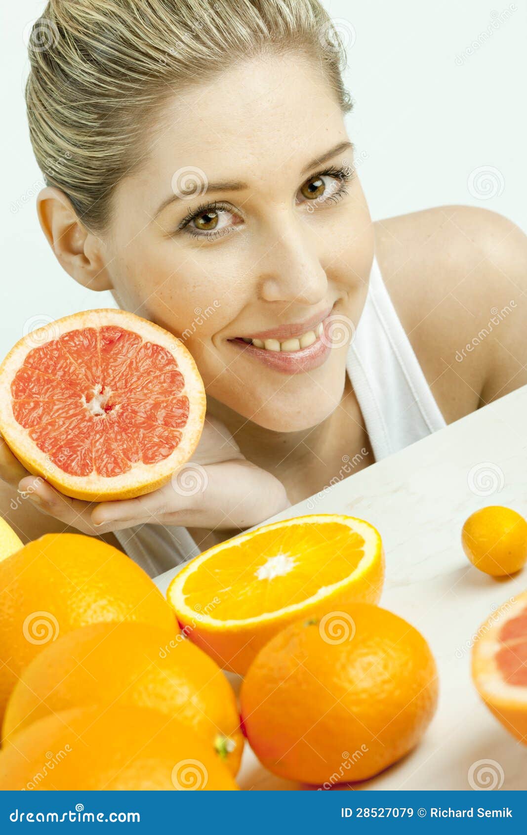 Woman with grapefruit stock image. Image of people, portrait - 28527079
