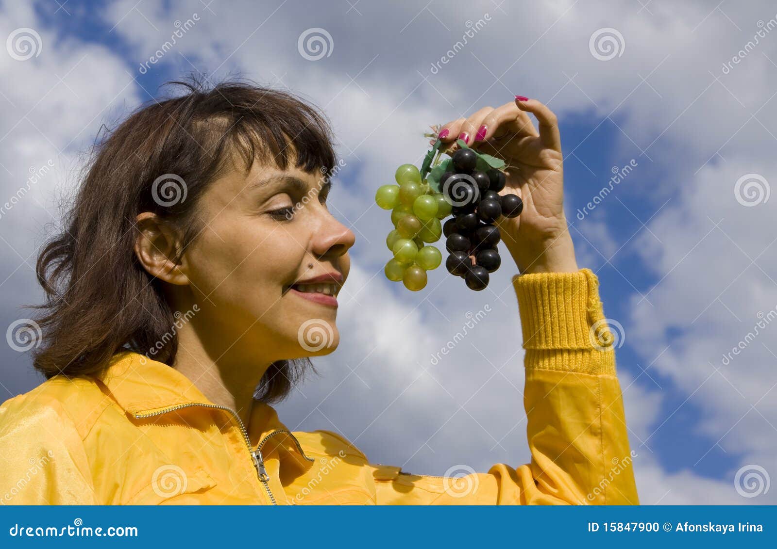 Woman with grapes stock photo. Image of yellow, beautiful - 15847900