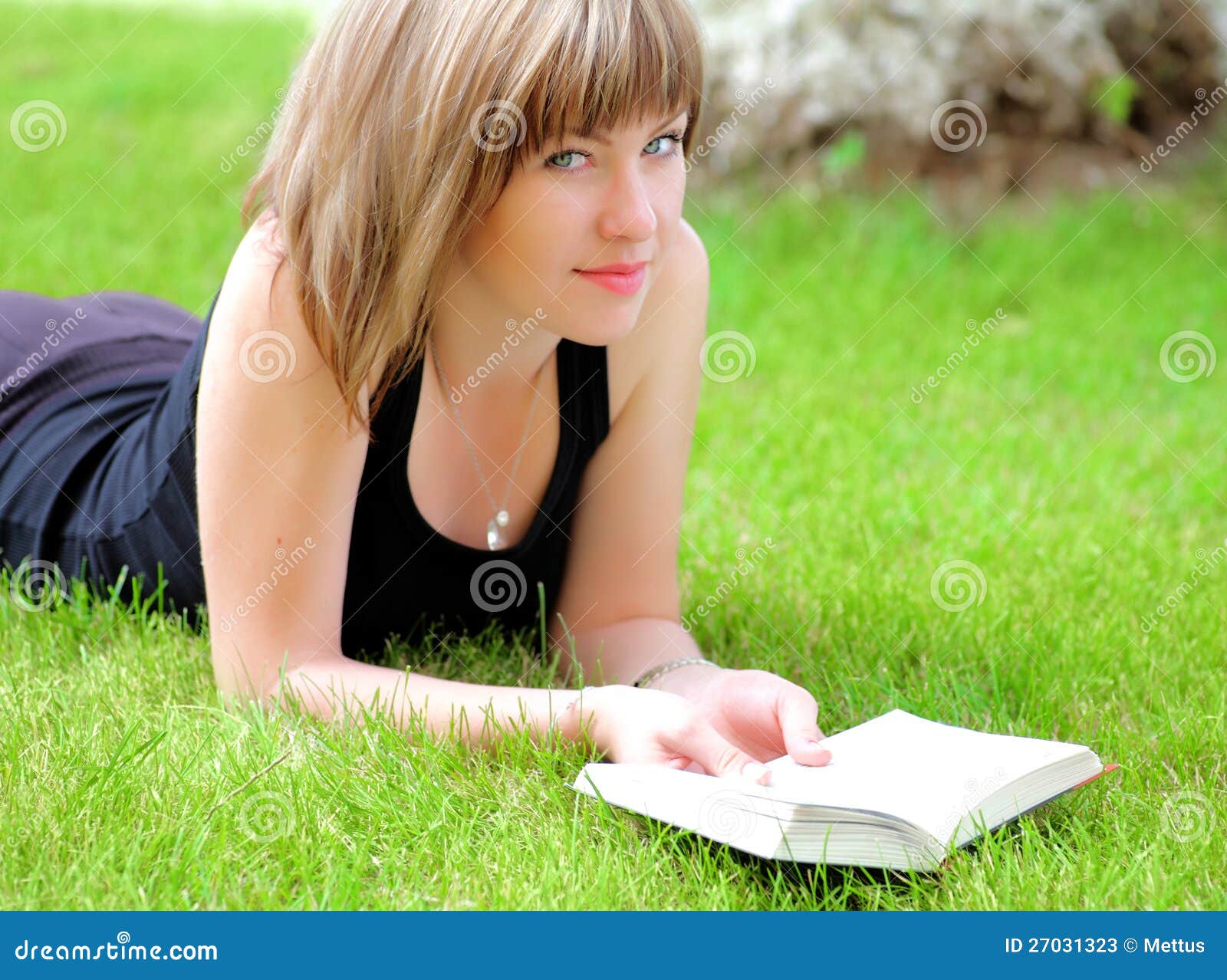 Woman on Grass Reading Book Stock Image - Image of adult, female: 27031323