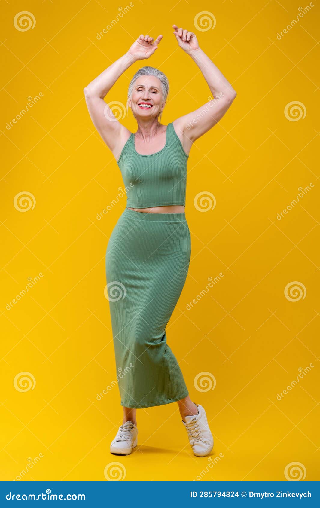 Woman in Green Dancing and Feeling Happy Stock Photo - Image of woman ...