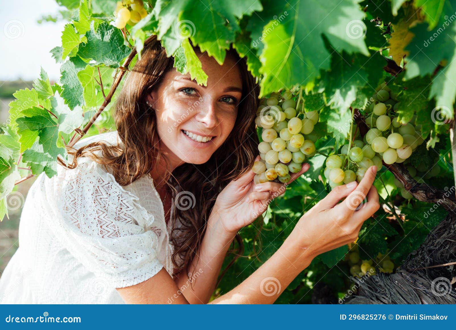 Beautiful Woman with Green Grapes in Park Stock Photo - Image of ...