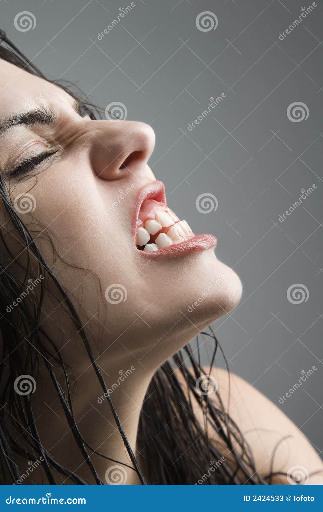 Woman grimacing. stock image. Image of eyes, brunette - 2424533