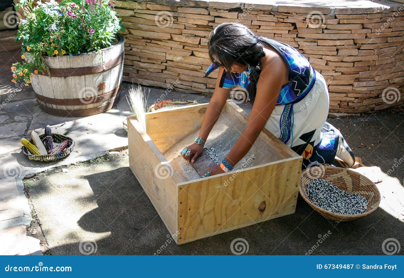 Woman Grinding Corn At Hopi Festival Of Arts And Culture Editorial