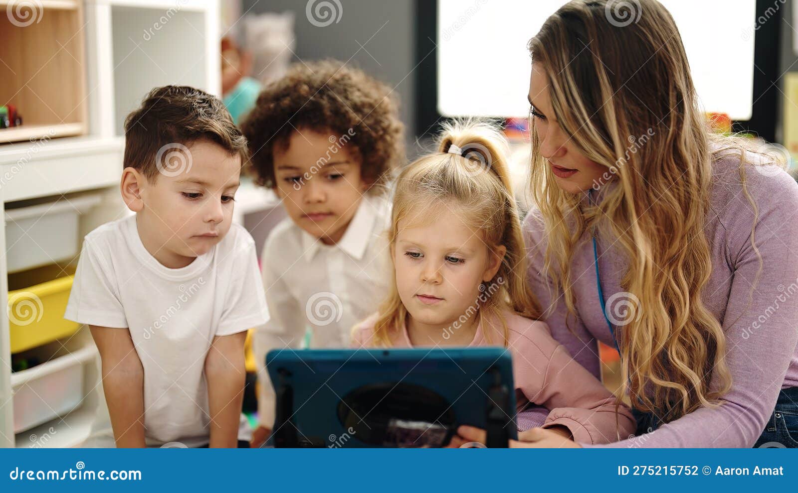 Woman and Group of Kids Having Lesson Using Touchpad at Kindergarten ...
