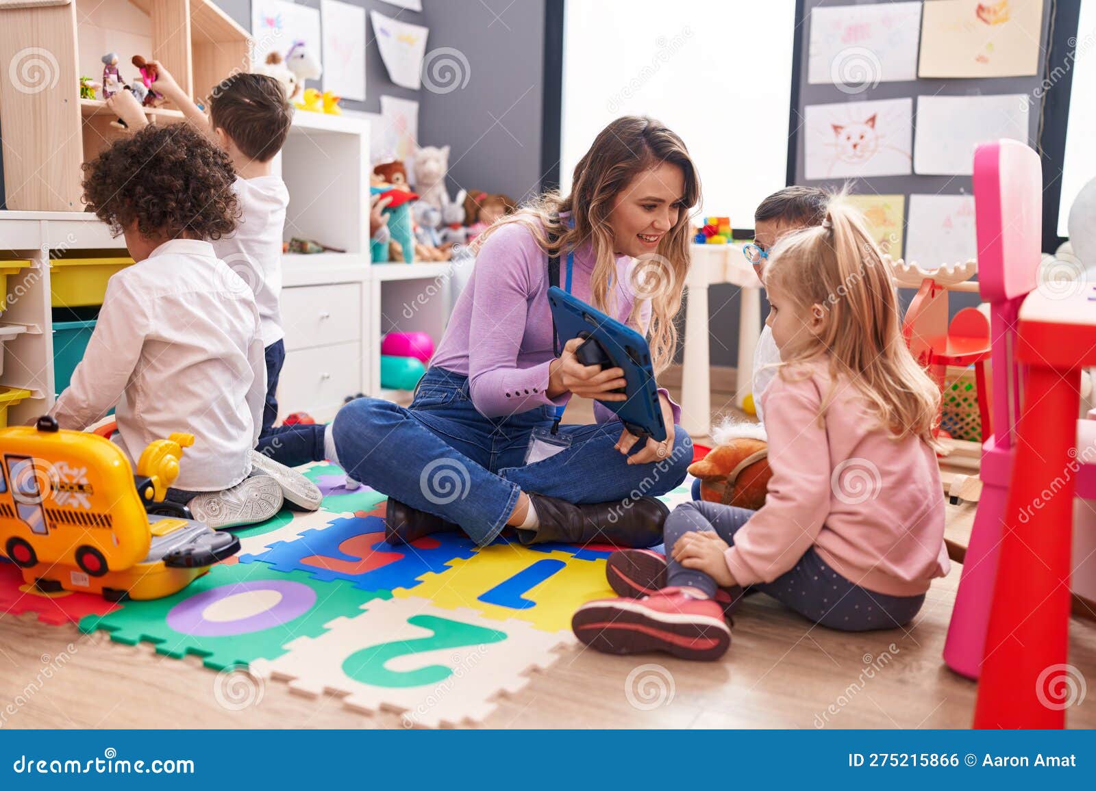 Woman and Group of Kids Having Lesson Using Touchpad at Kindergarten ...