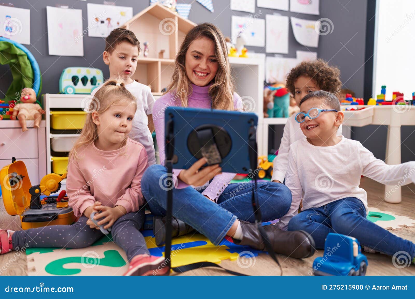 Woman and Group of Kids Having Lesson Using Touchpad at Kindergarten ...