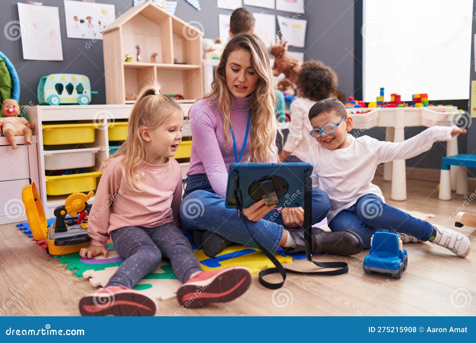 Woman and Group of Kids Having Lesson Using Touchpad at Kindergarten ...