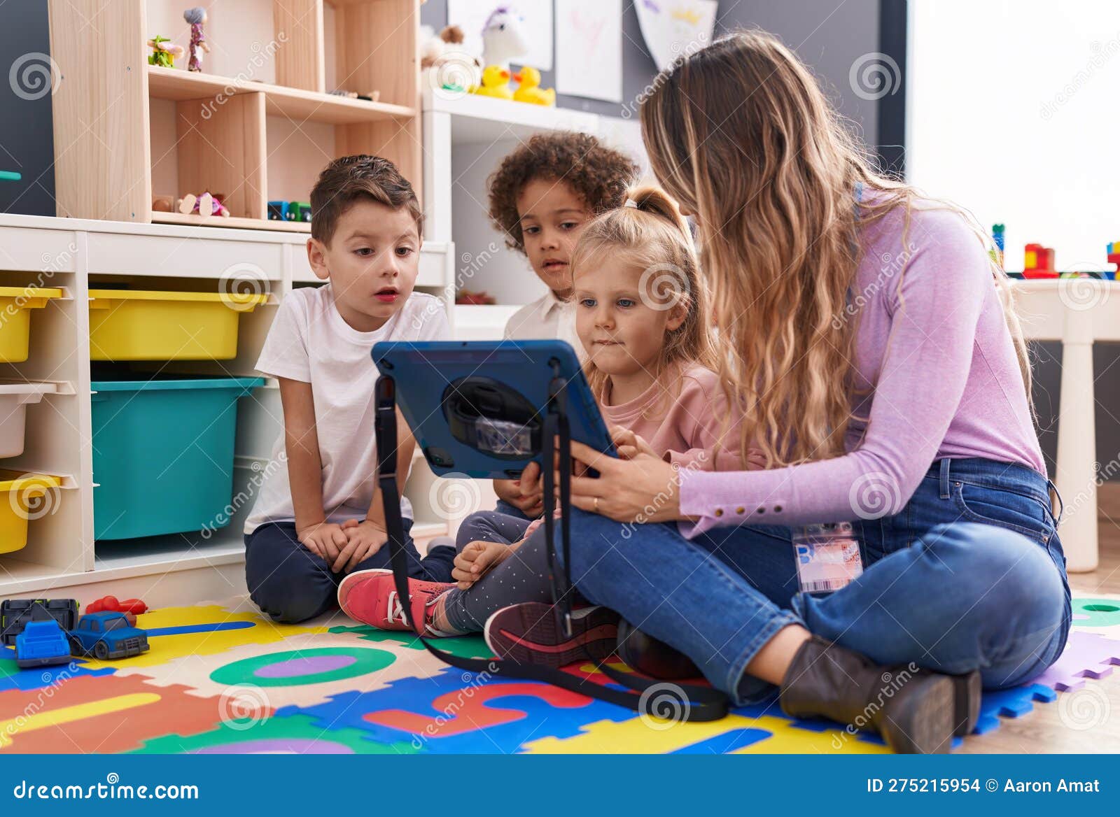 Woman and Group of Kids Having Lesson Using Touchpad at Kindergarten ...