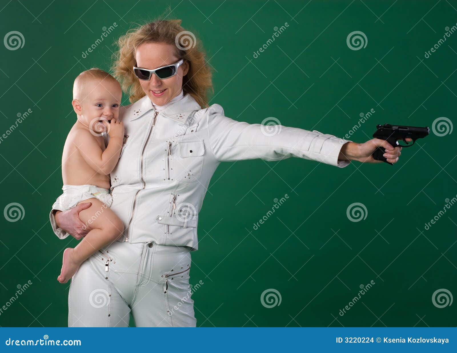 Woman With Gun And Son Picture. Image: 3220224
