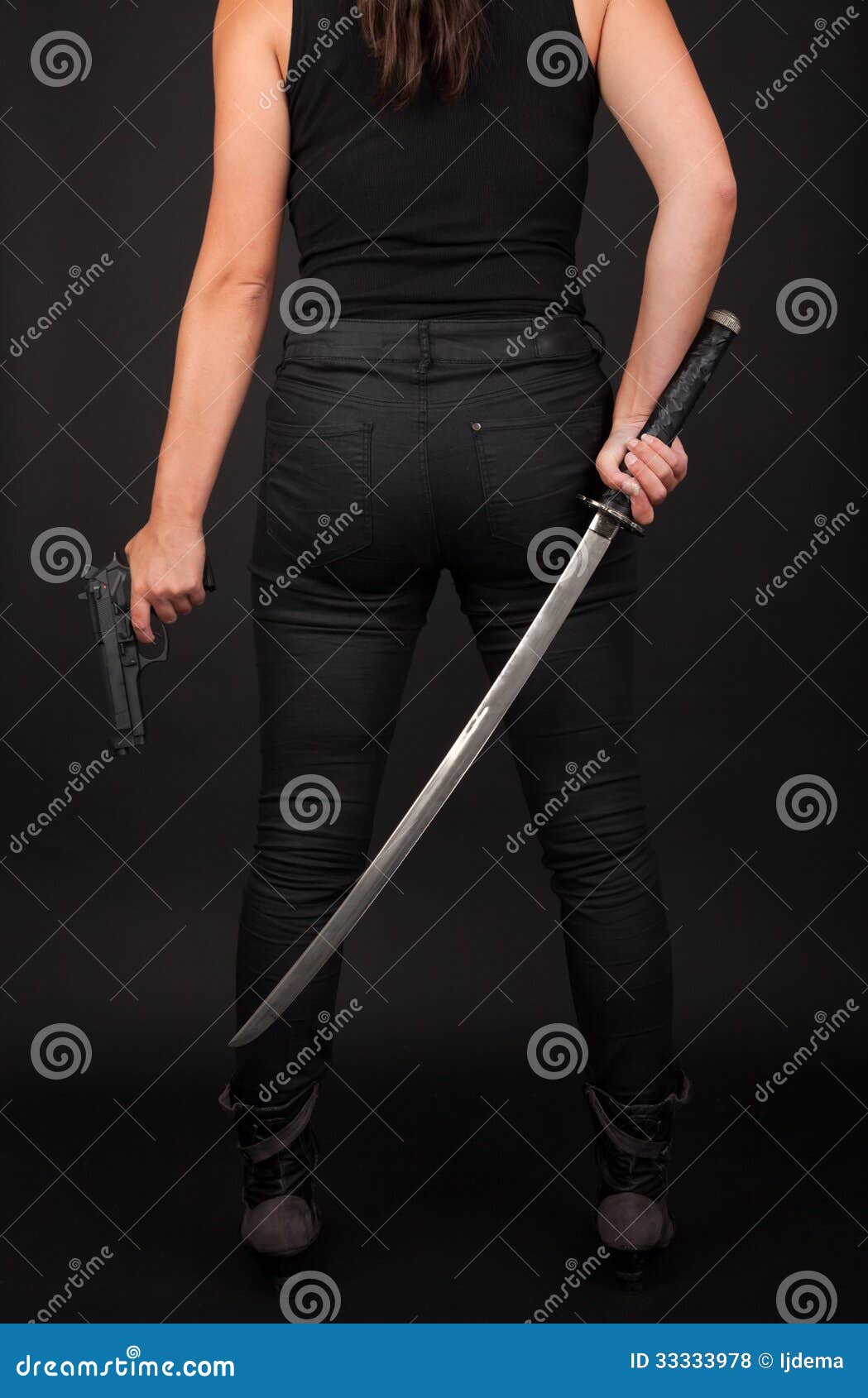 Woman with gun and sword stock photo. Image of attractive - 33333978
