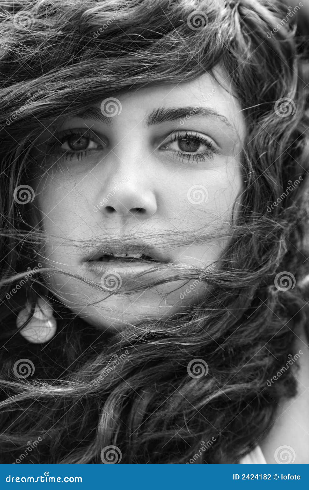 Woman with hair in face. stock photo. Image of looking - 2424182