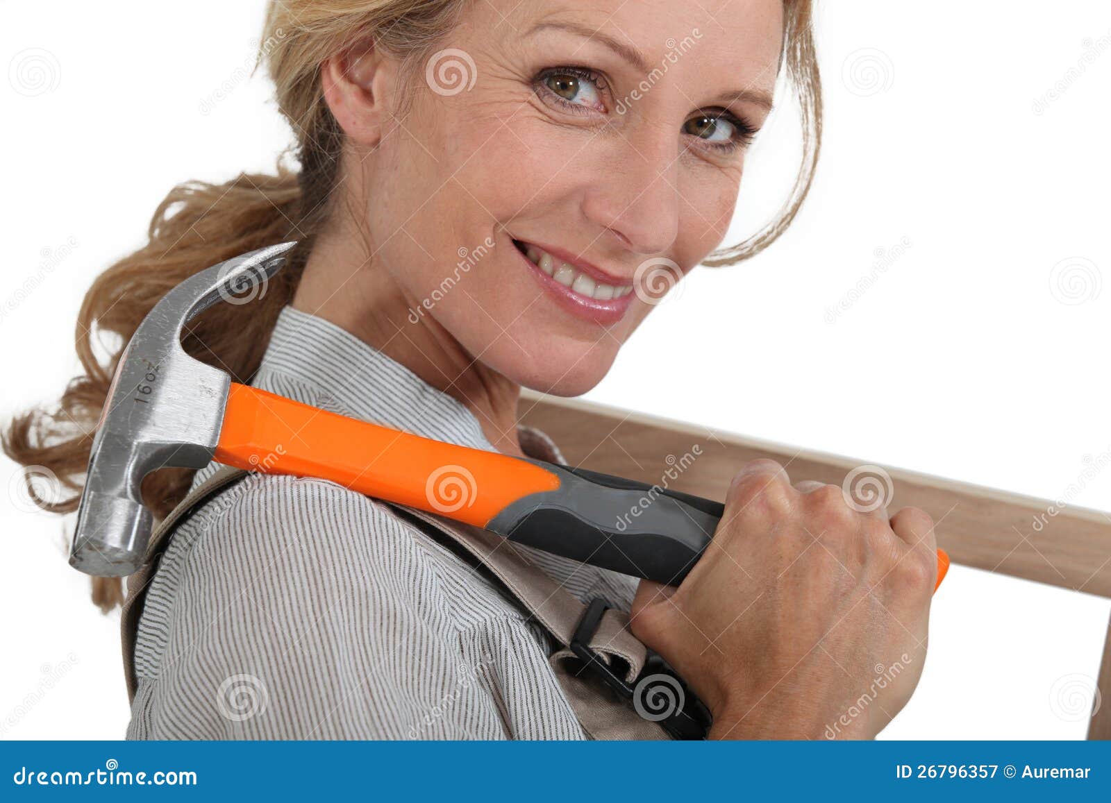 Woman with hammer stock image. Image of blonde, shirt - 26796357