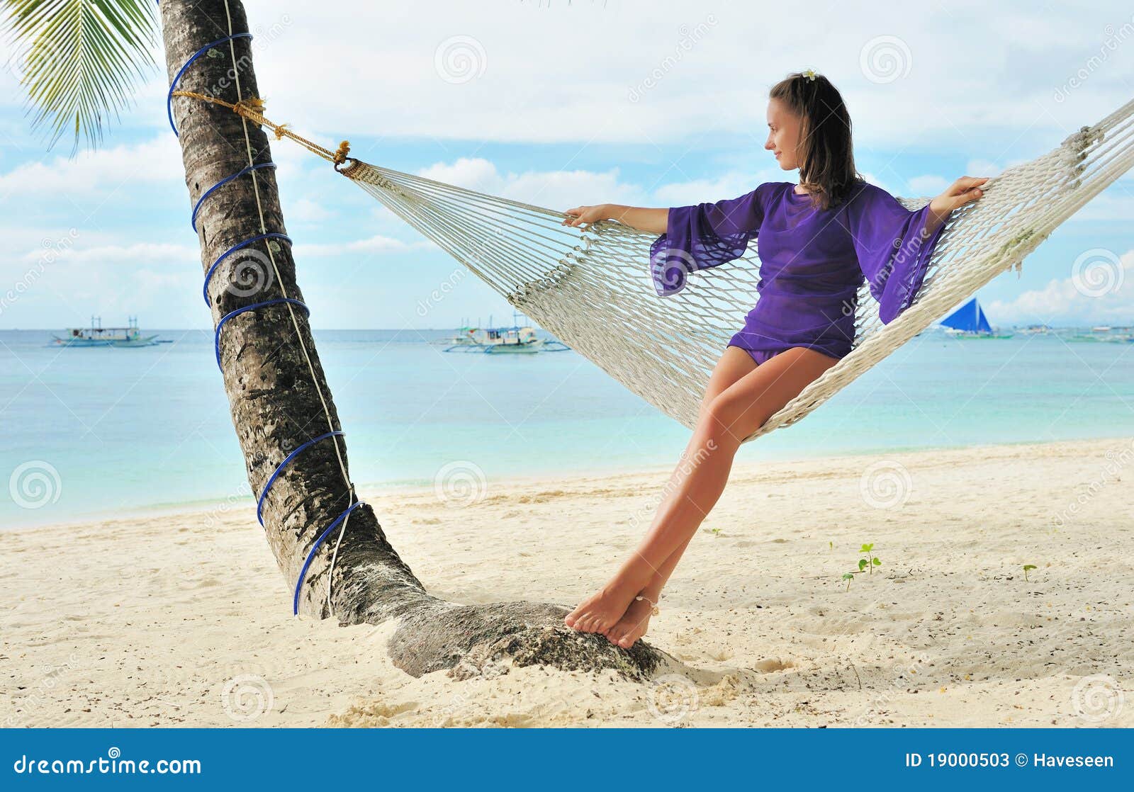 Woman in hammock on beach stock image. Image of summer - 19000503