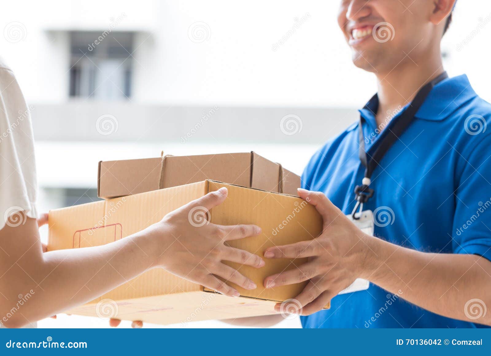Woman Hand Accepting a Delivery of Boxes from Deliveryman Stock Photo ...