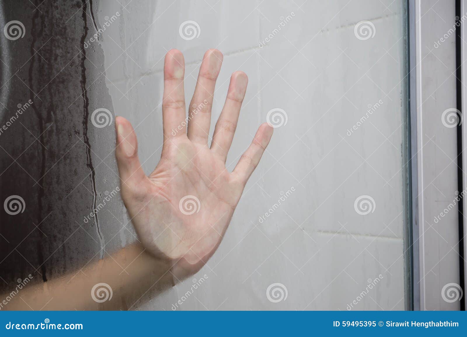 Woman hand behind glass 1 stock image. Image of shower - 59495395