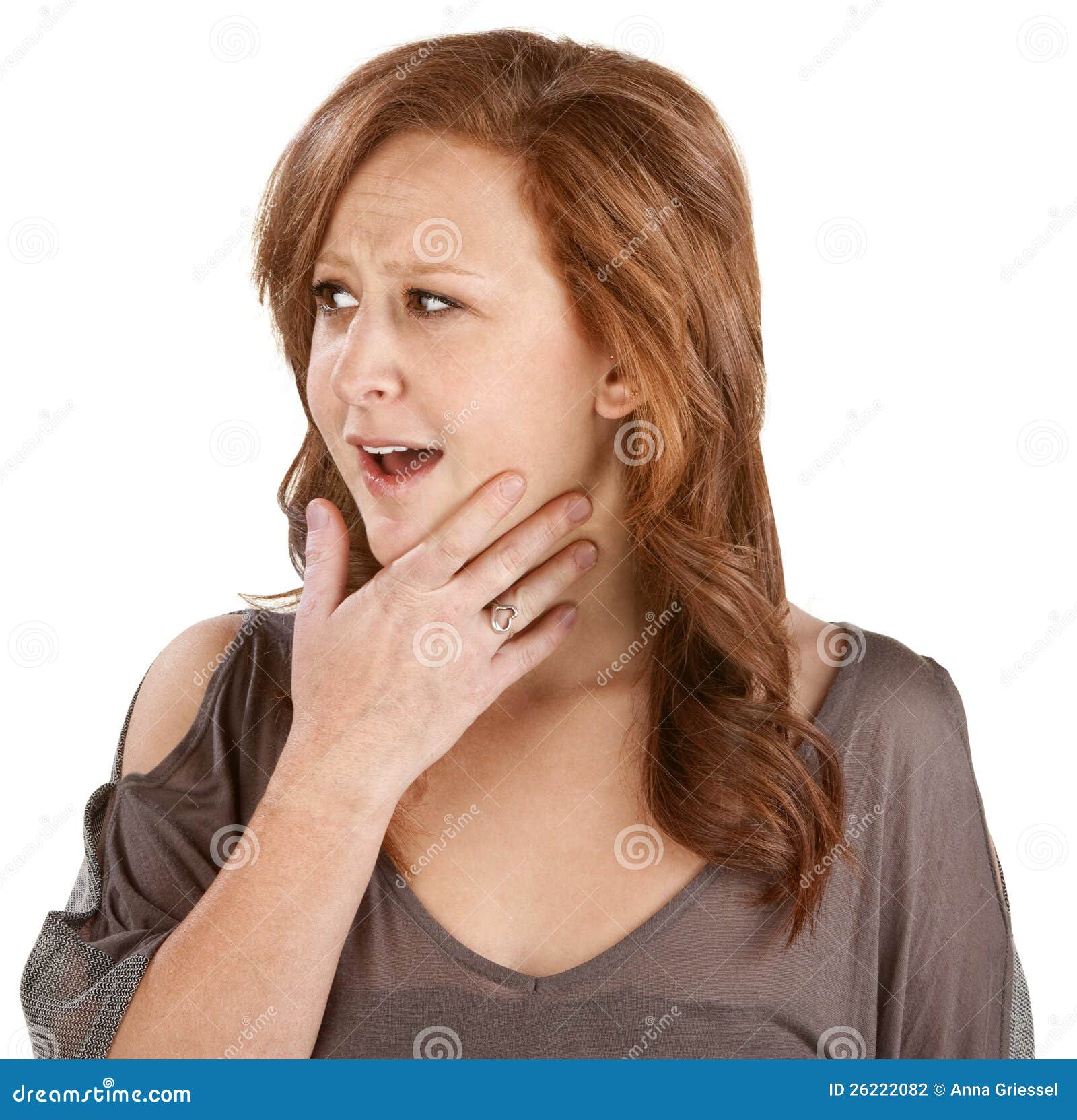 Woman with Hand on Chin stock photo. Image of astonished - 26222082