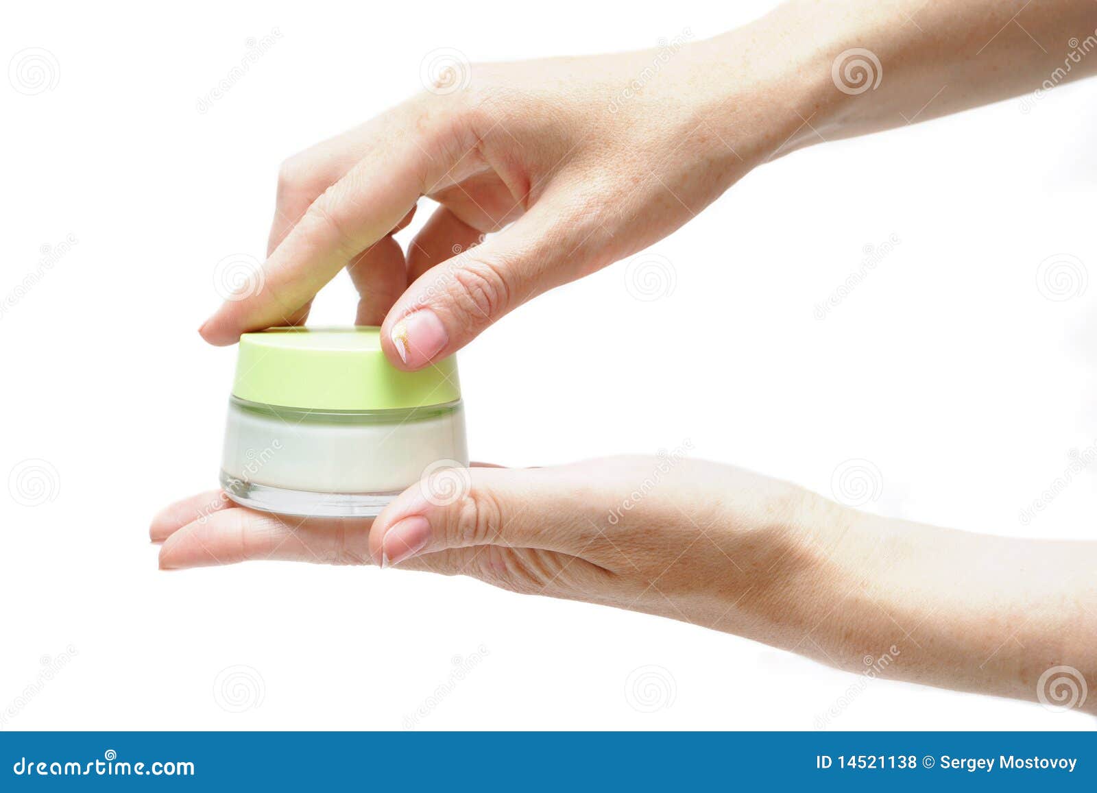 Woman hand with cream pot stock photo. Image of container - 14521138