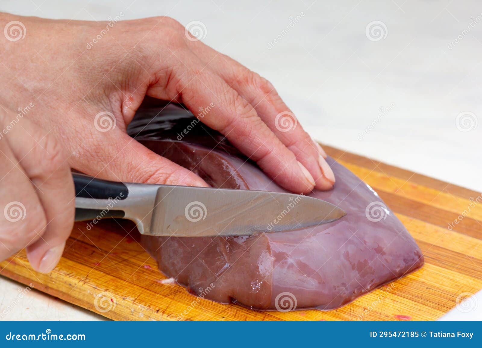 Woman Hand Cutting Beef Liver on Cutting Board Stock Image - Image of ...