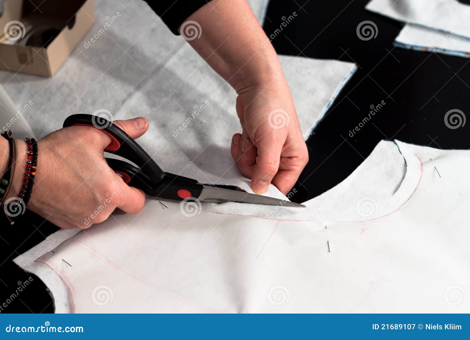 Woman hand cutting fabric stock image. Image of design - 21689107
