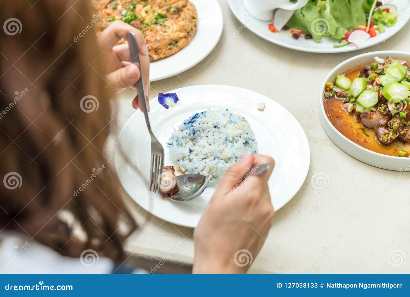 Woman hand eating rice stock image. Image of concept - 127038133