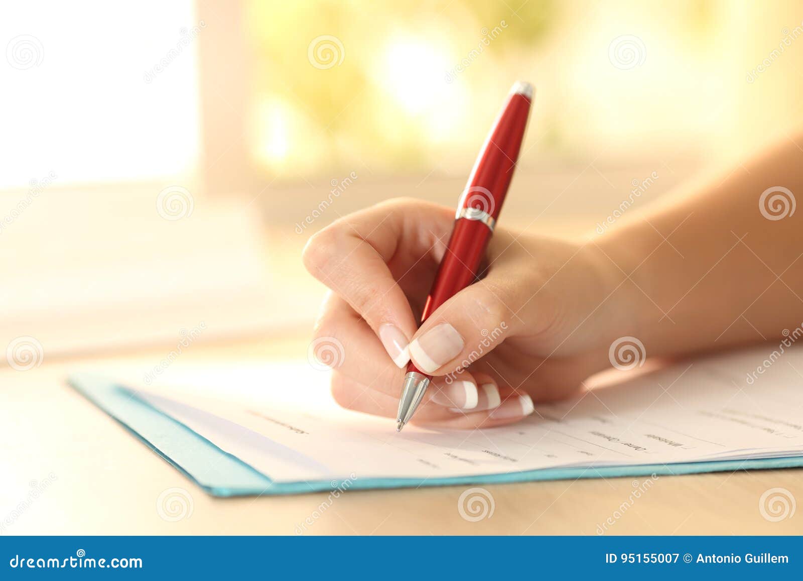 Woman Hand Filling Form on a Table Stock Image - Image of agreement ...