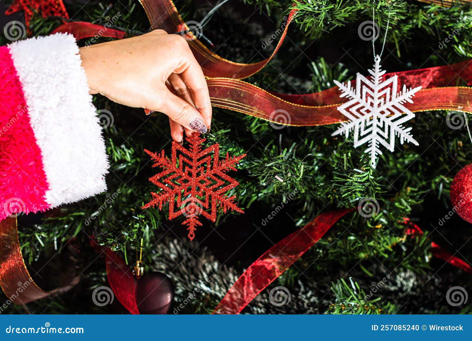 Woman Hand Hanging Christmas Tree Decorations Stock Photo - Image of ...