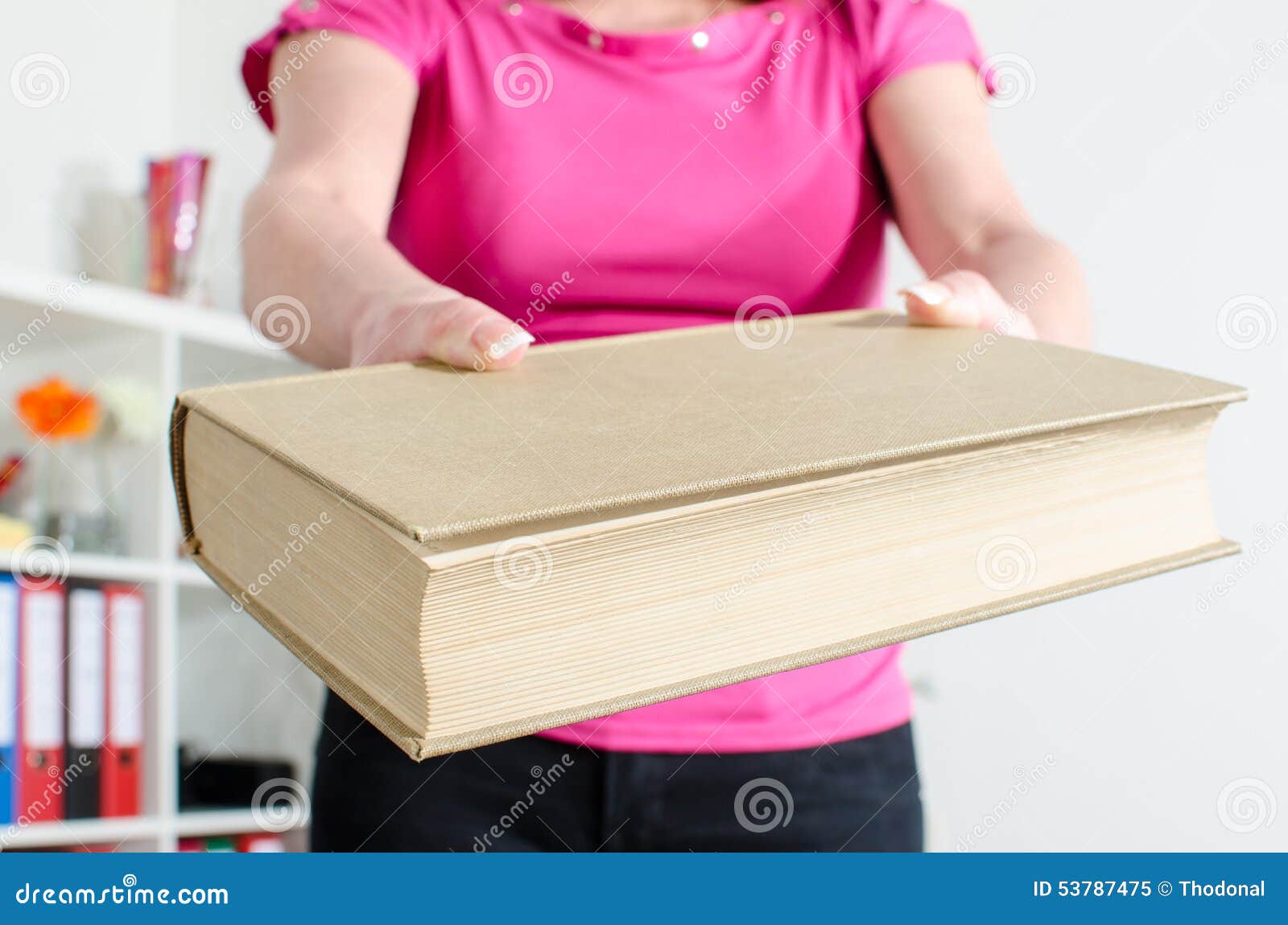 Woman hand holding a book stock image. Image of university - 53787475