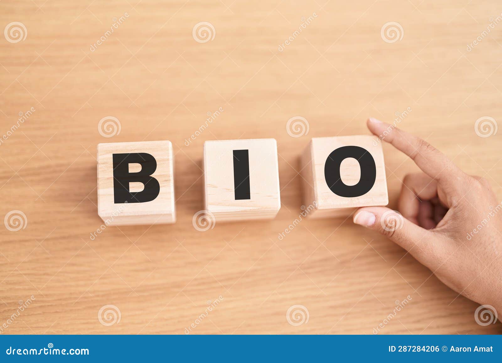 Woman Hand Holding Cubes with Bio Word on the Table Stock Photo - Image ...