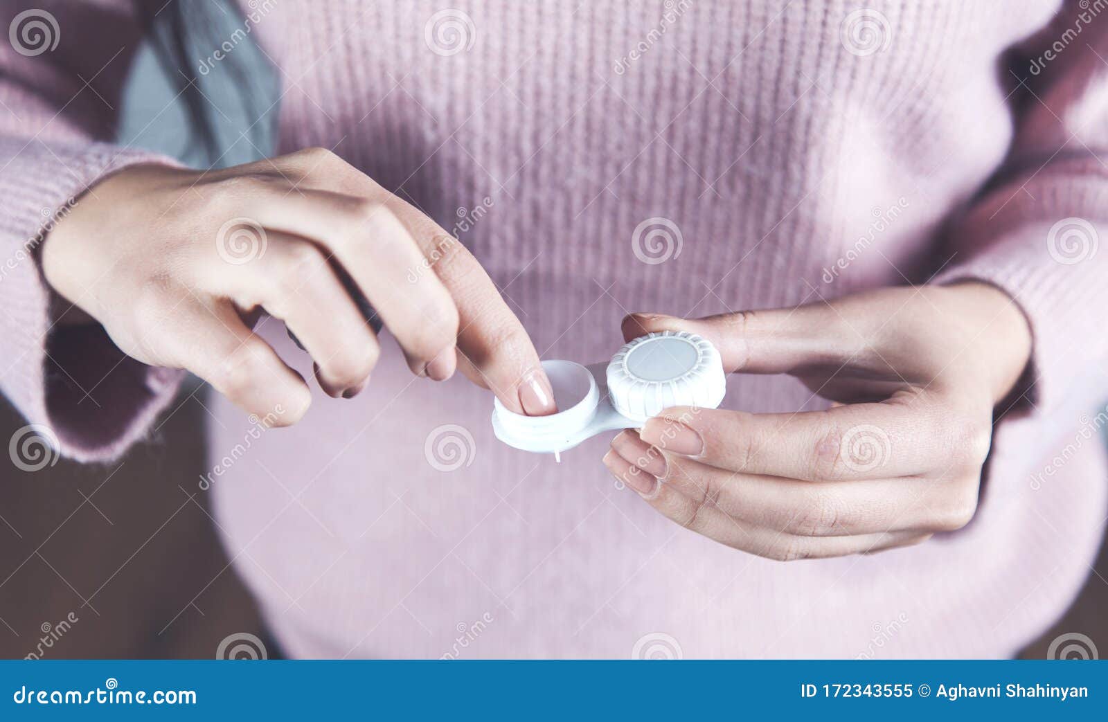 Woman hand holding lenses stock image. Image of lenses - 172343555