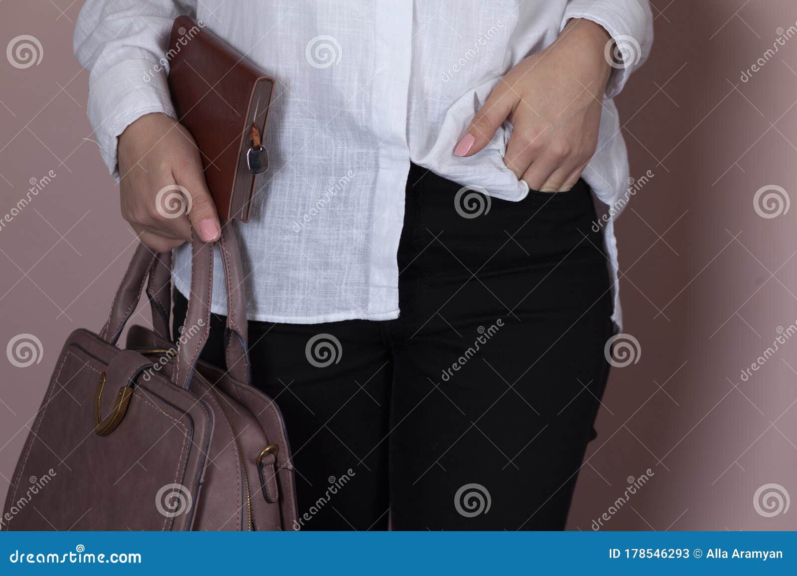 Woman Hand Holding Notepad with Bag Stock Image - Image of fashion ...