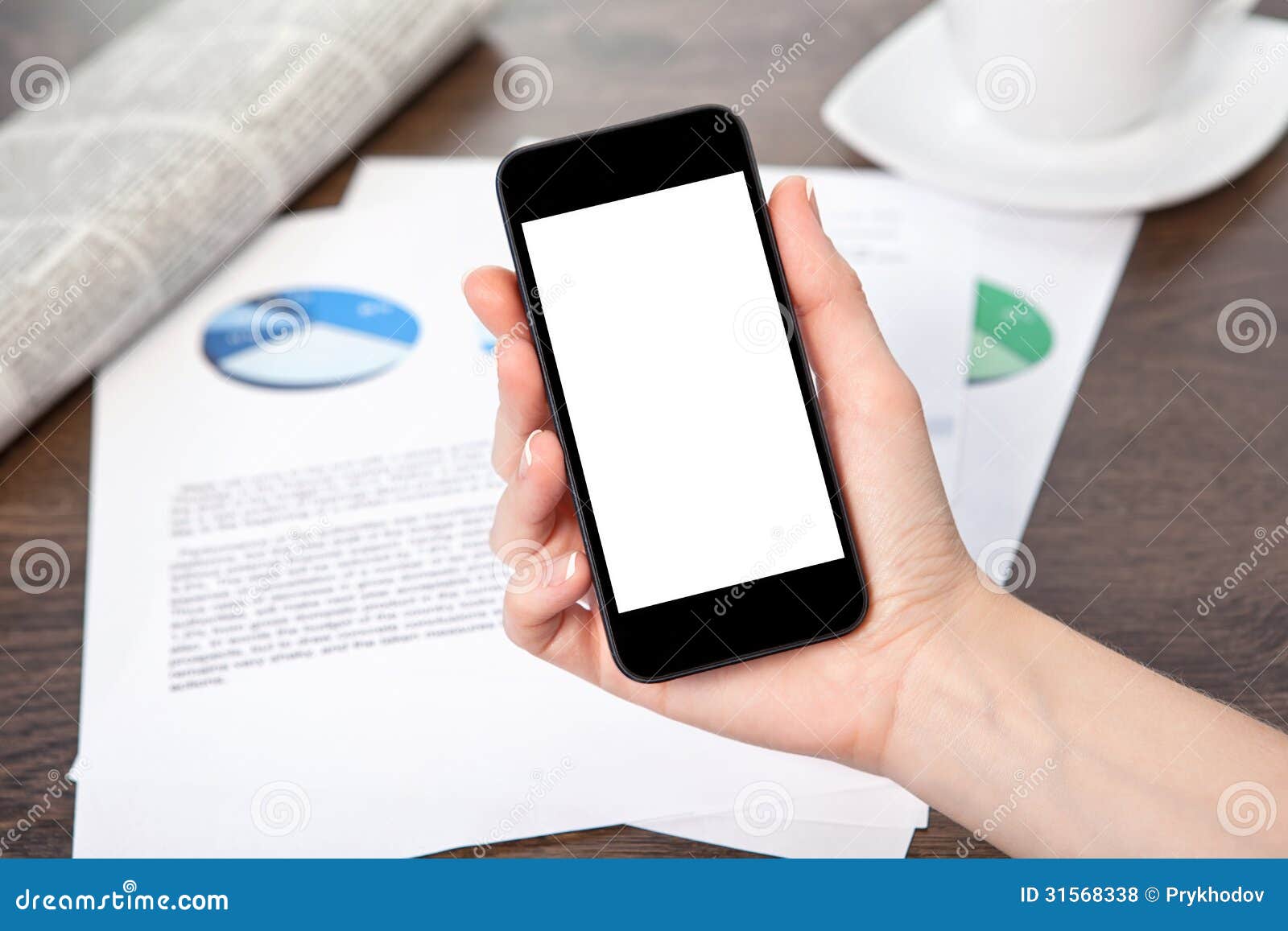 Woman Hand Holding a Phone on the Table with Graphics Stock Photo ...