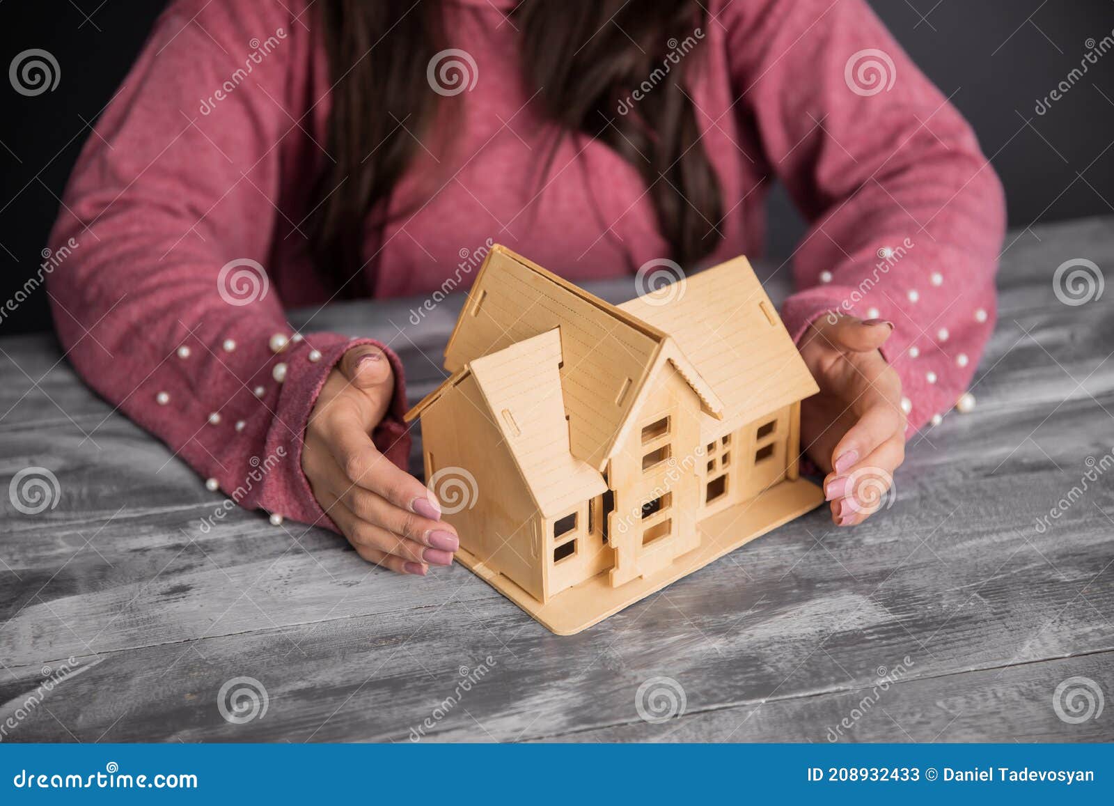 Woman hand house model stock image. Image of mortgage - 208932433