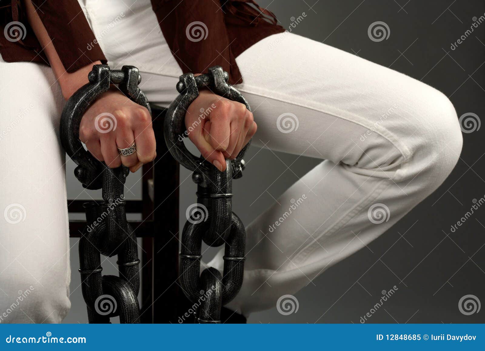 Woman Hand In Large Handcuffs Stock Image - Image: 12848685 Woman Hand In Large Handcuffs Stock Image - Image: 12848685