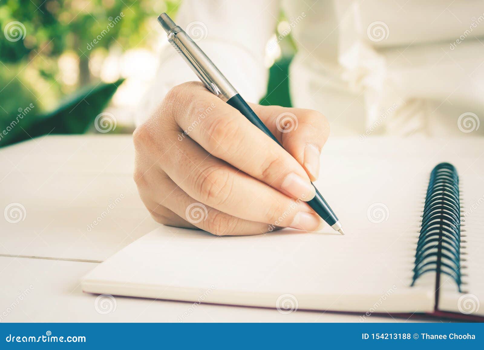 Woman Hand with Pen Writing on White Notebook. Stock Photo - Image of ...