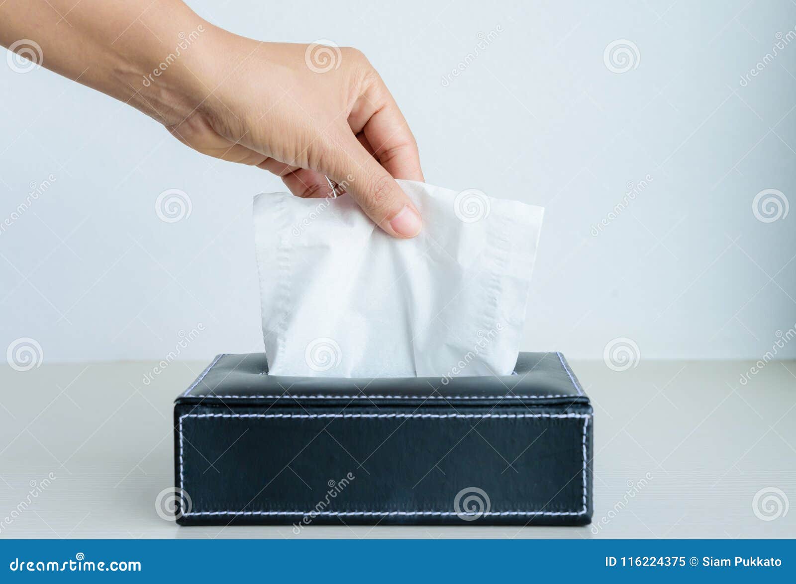 Woman Hand Picking White Tissue Paper from Tissue Box. Stock Image ...