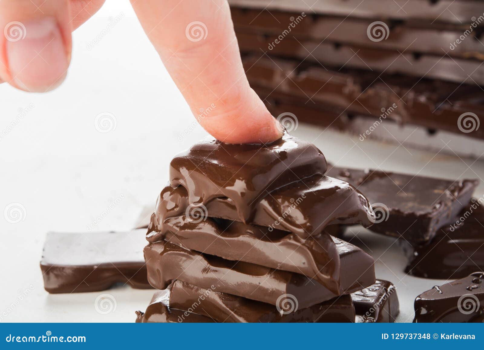 Melted Chocolate Bar In Hand