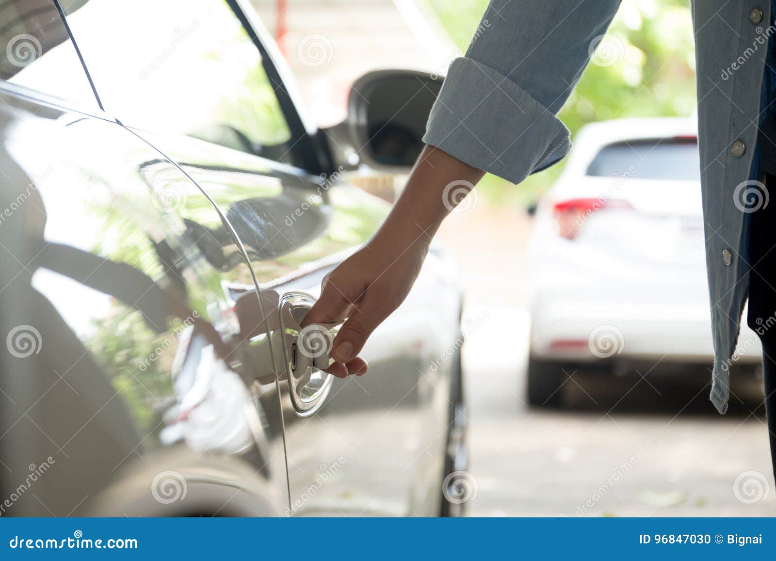 Woman Hand Pulling Car Door Handle To Open the a Car Stock Photo ...