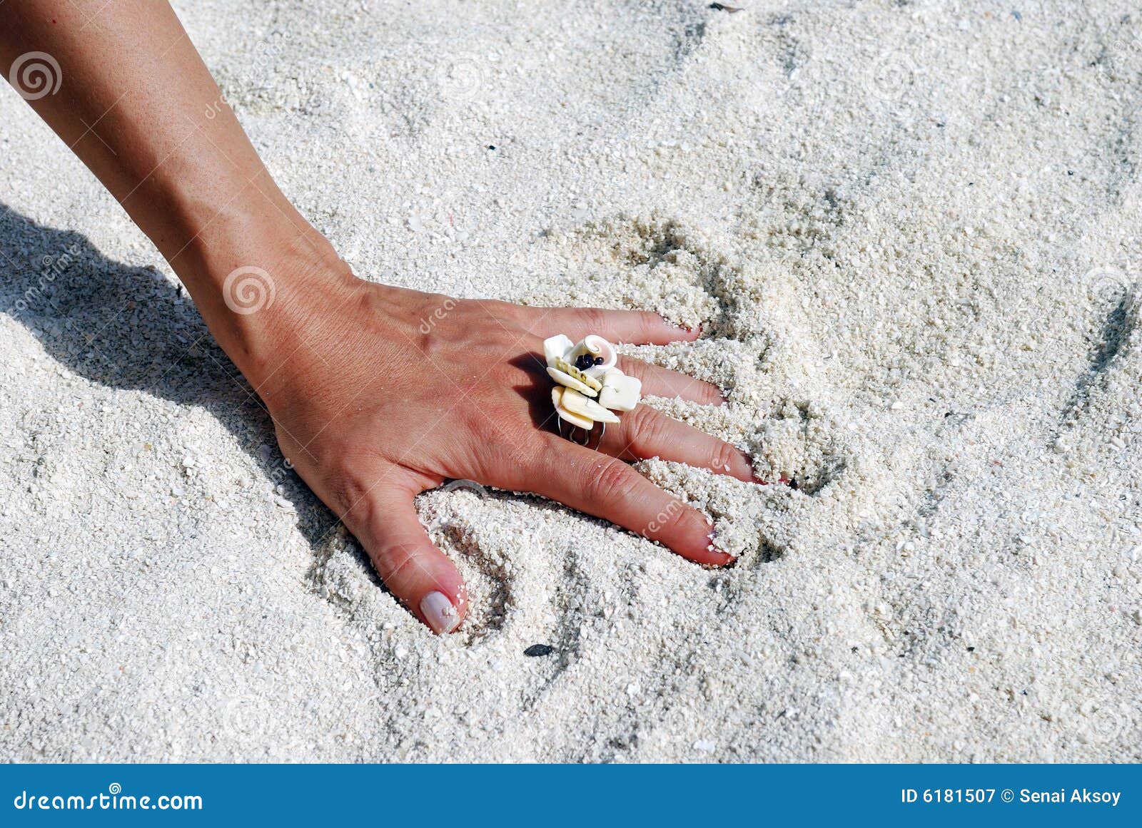 Woman hand in the sand stock image. Image of body, action - 6181507