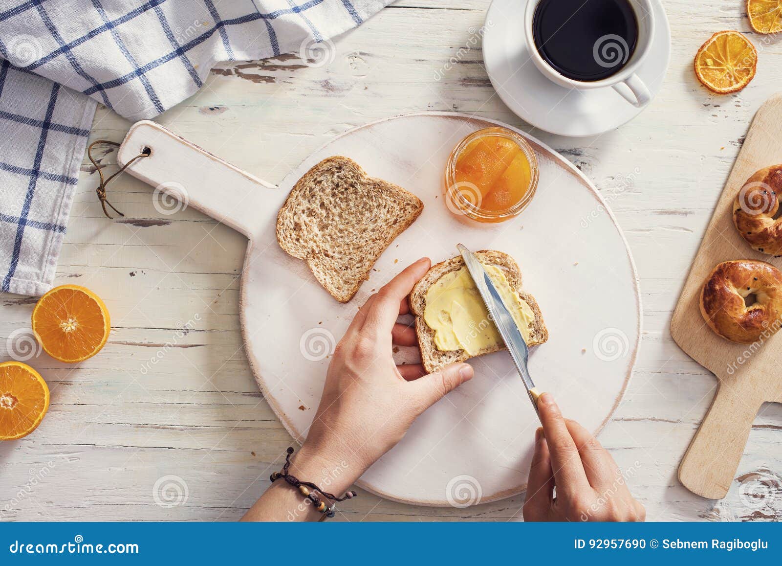 Spreading Butter Over Toasted Bread For Breakfast. Retro Toaster In The ...