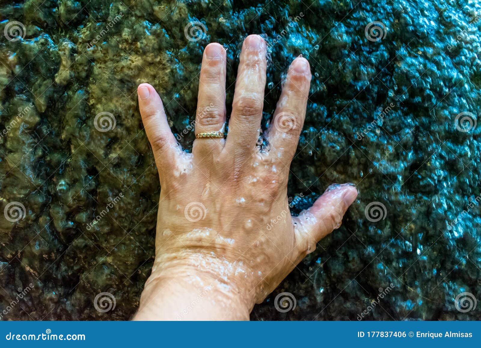 Woman Hand on Stone Falling Water Stock Photo - Image of caucasian ...