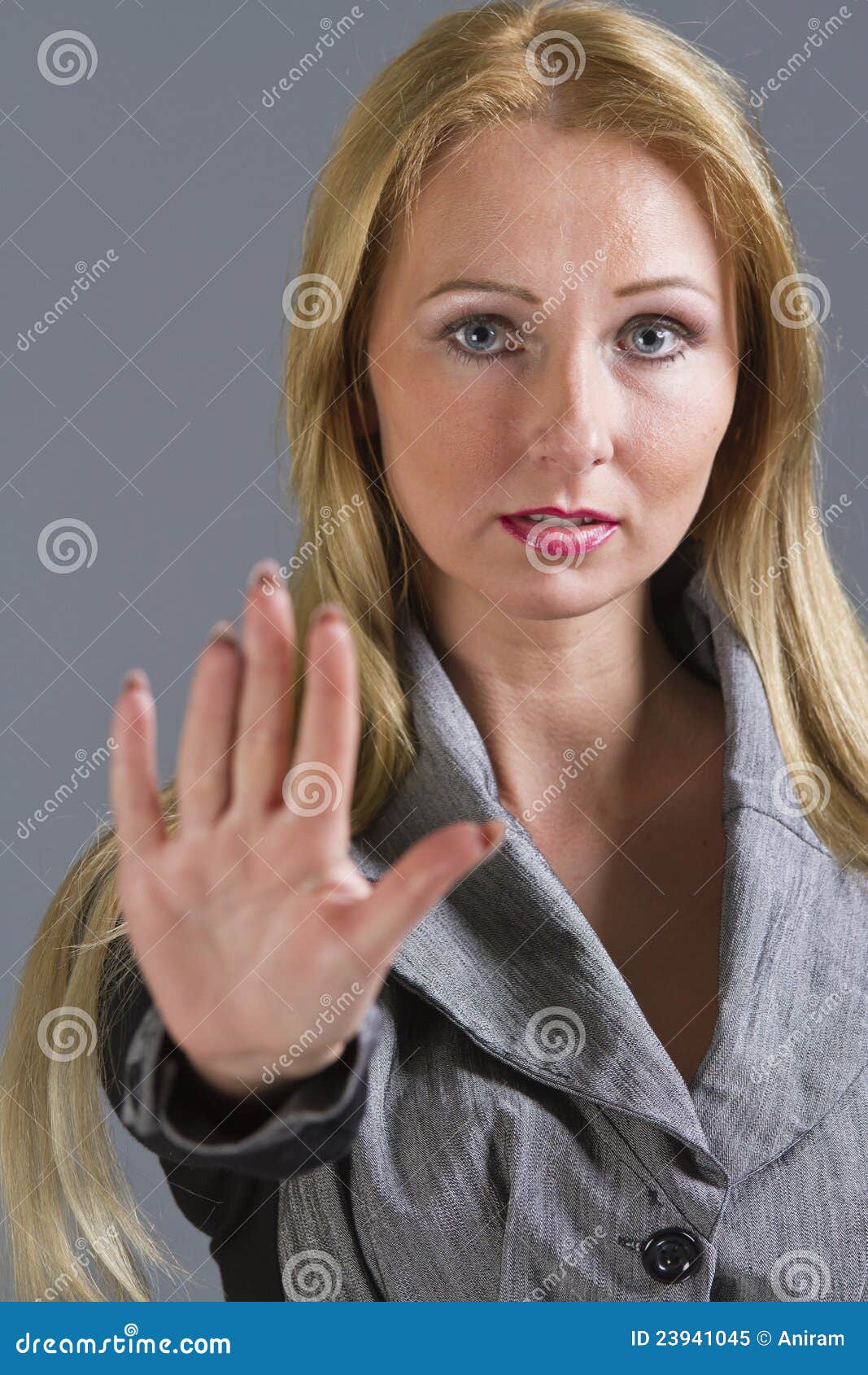 Woman with Hand Stop Gesture Stock Image - Image of woman, blouse: 23941045